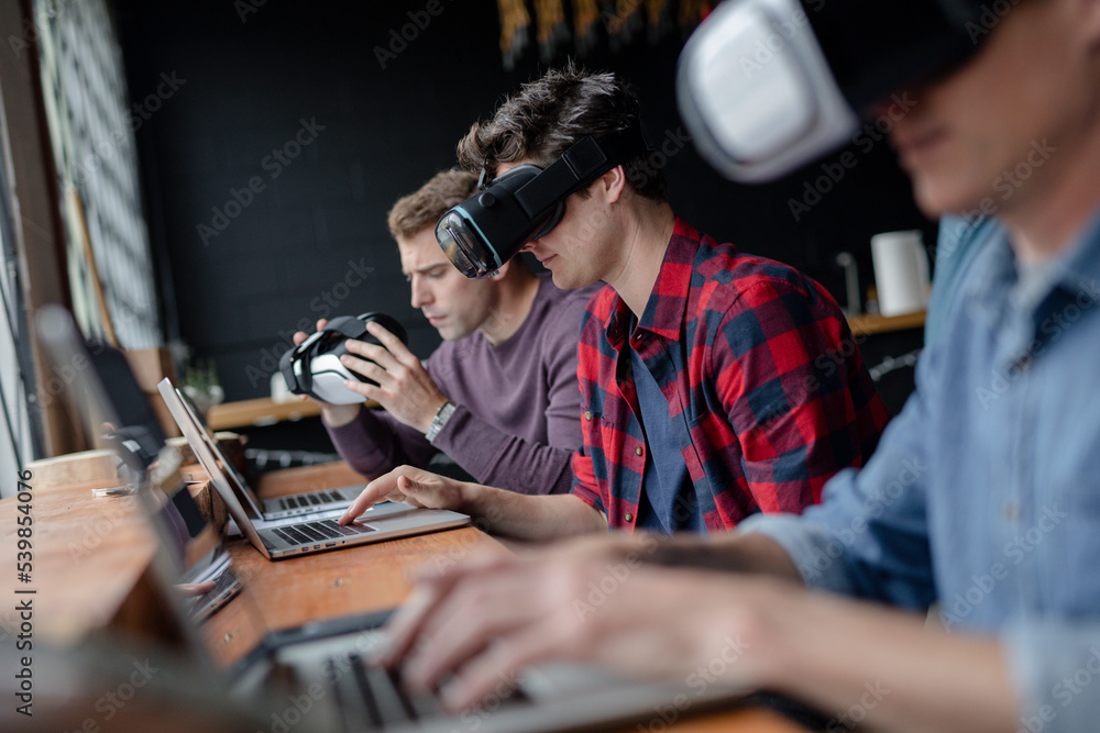 Male Computer Programmer Testing And Programming Virtual Reality