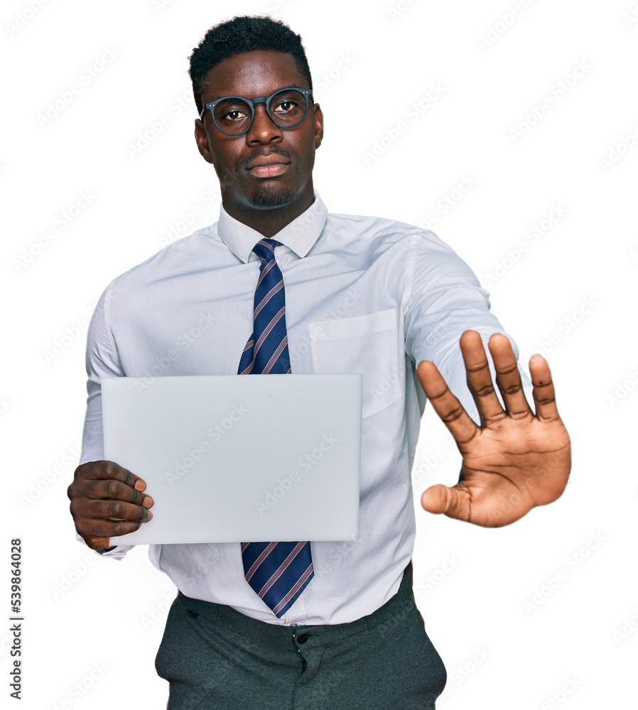 Handsome business black man holding blank empty banner with open hand ...