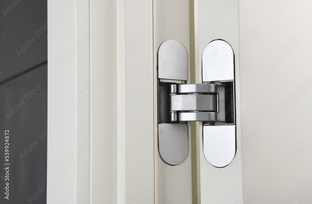White Hinges New Modern Metal Door Hinges On White Wooden Doors Stock