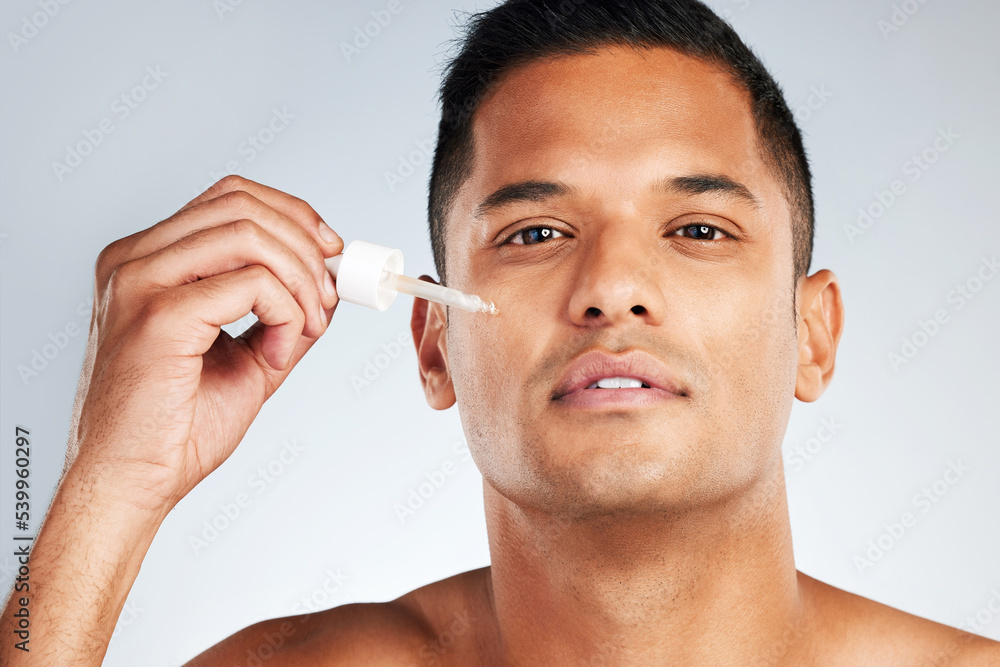 Man beauty, face and health serum oil for glowing, healthy and ...