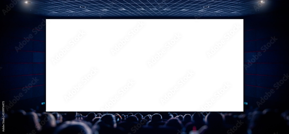 Cinema. White screen in the cinema and the audience watching the movie ...