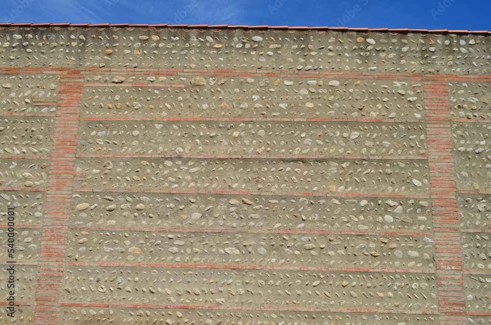 Mur construit en galets et briques. (France) Stock Photo | Adobe Stock