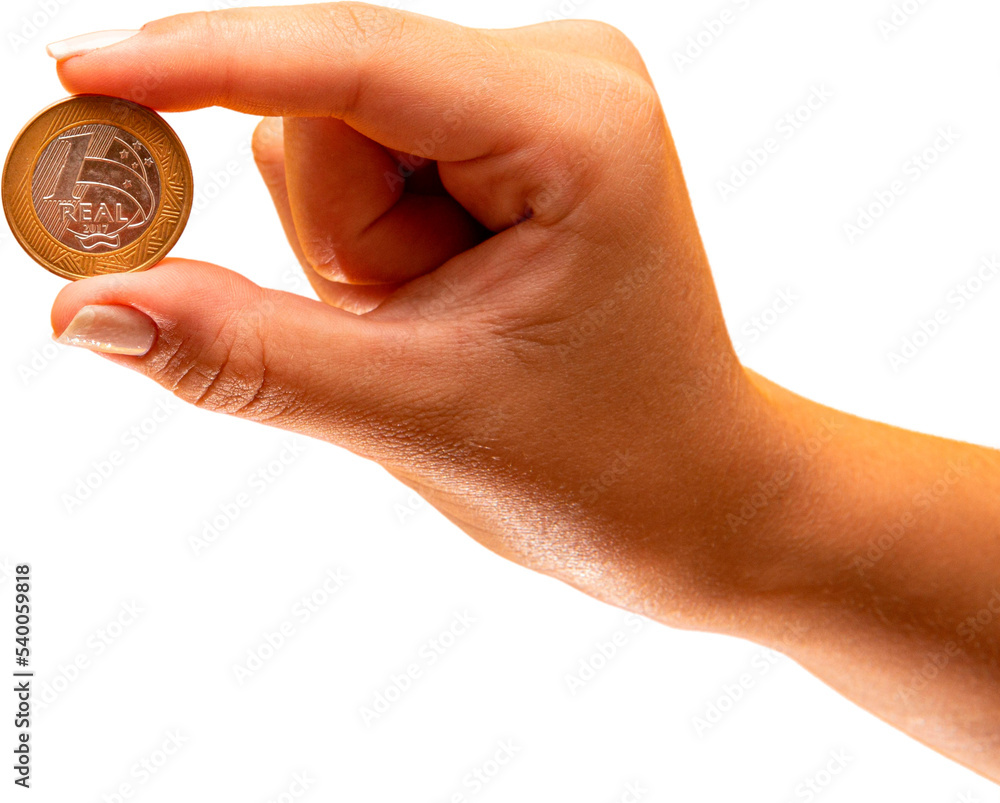 Hand holding one Real coin of Brazil on transparent background. Finance ...