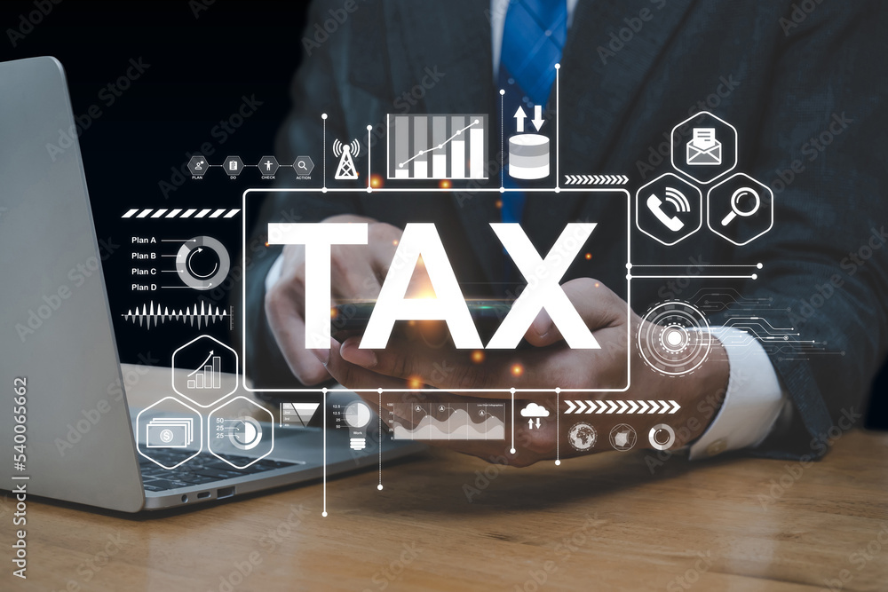 business people hand using mobile smart phone with virtual TAX graphic ...