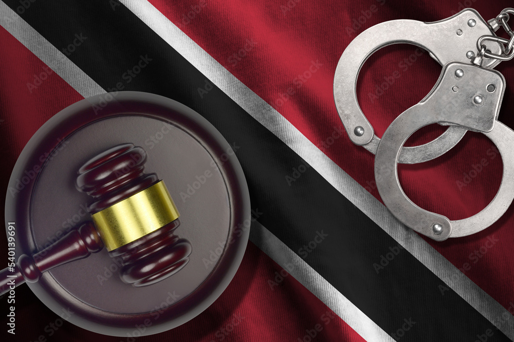 Trinidad And Tobago Flag With Judge Mallet And Handcuffs In Dark Room