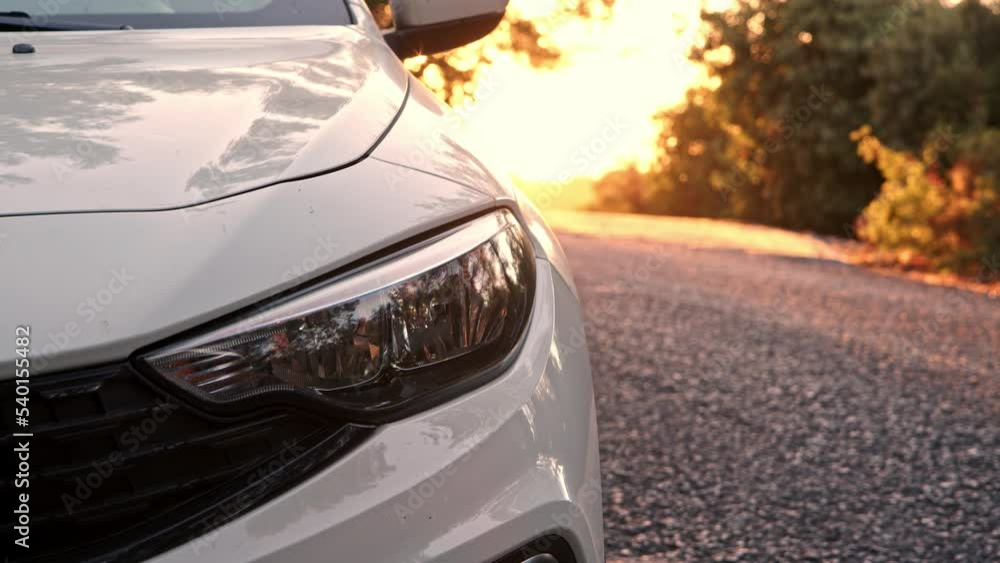 Close up view of front light of car headlights. unrecognizable white ...
