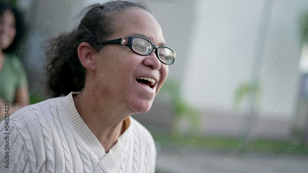 One happy senior woman laughing and smiling. South American hispanic ...