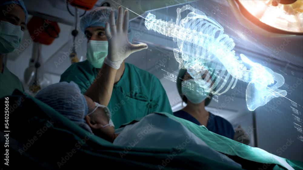 Futuristic biomedical concept of a doctor using advance holographic ...