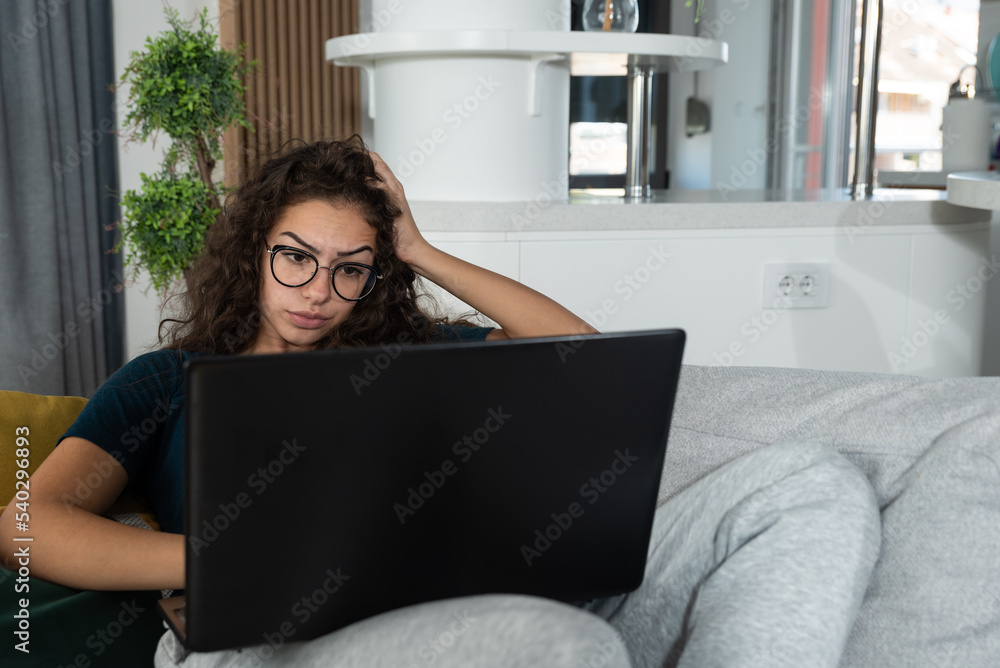 Young schoolgirl or college student teenage reading examination ...