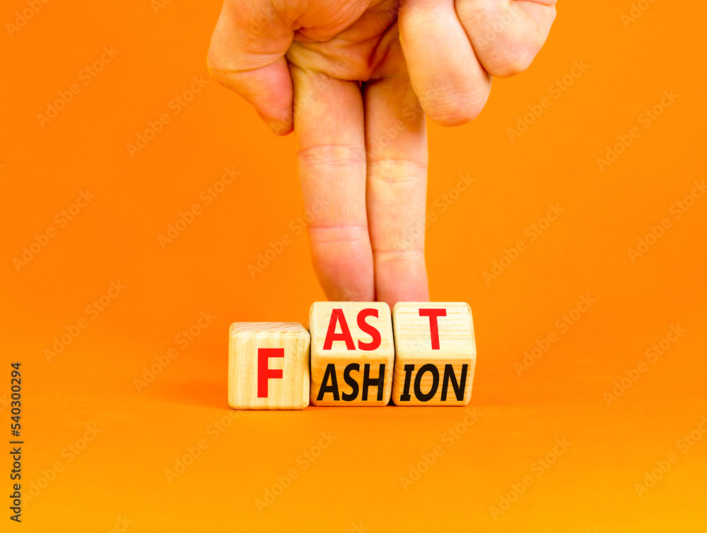 Fast fashion symbol. Concept words Fast fashion on wooden cubes ...