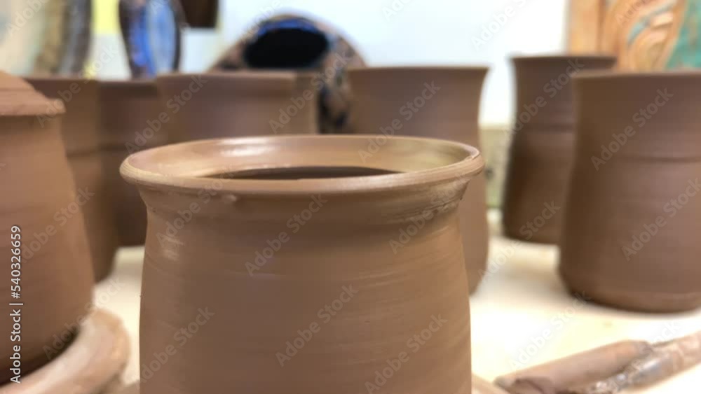 Clay crafts pottery studio wood table traditional Stock Video | Adobe Stock