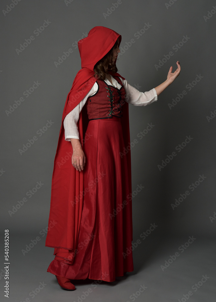 Full length portrait of woman wearing red medieval fantasy costume ...