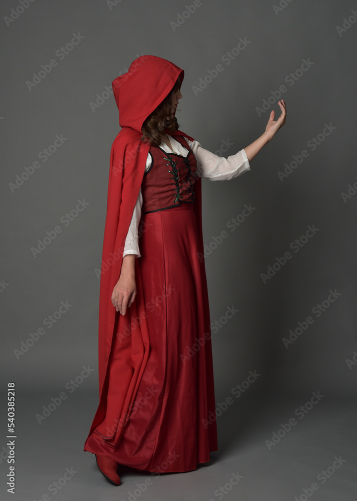 Full length portrait of woman wearing red medieval fantasy costume ...
