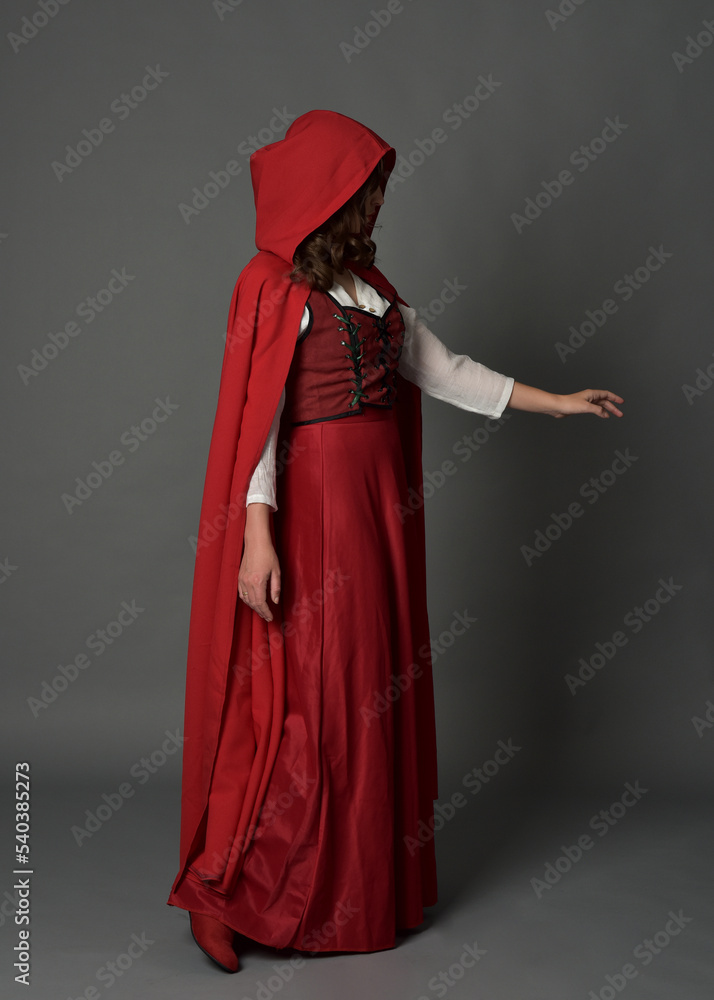 Full length portrait of woman wearing red medieval fantasy costume ...