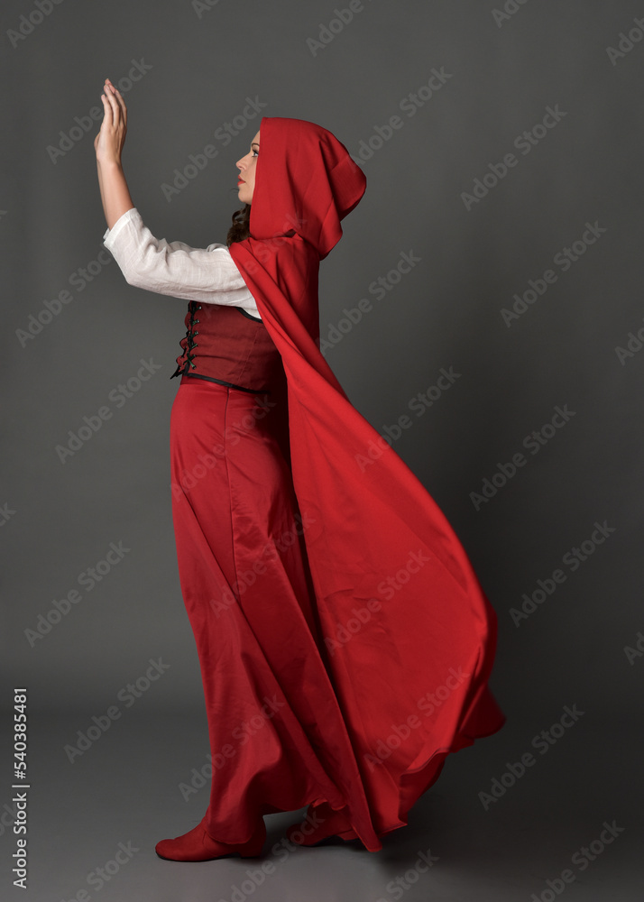 Full length portrait of woman wearing red medieval fantasy costume ...