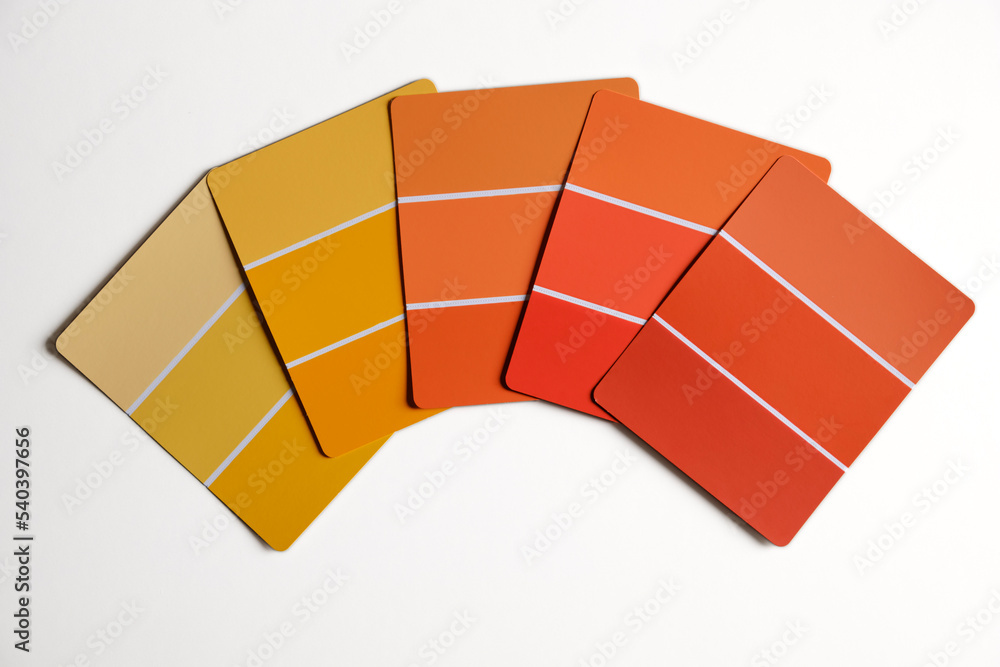 Generic sample color swatches fanned out on a table. Swatches are in ...