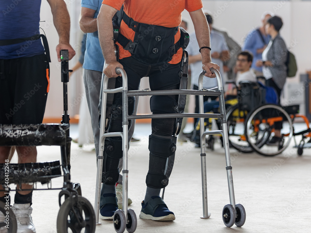 Photo & Art Print Boy with Mobility Problems in Lower Limbs in Upright ...