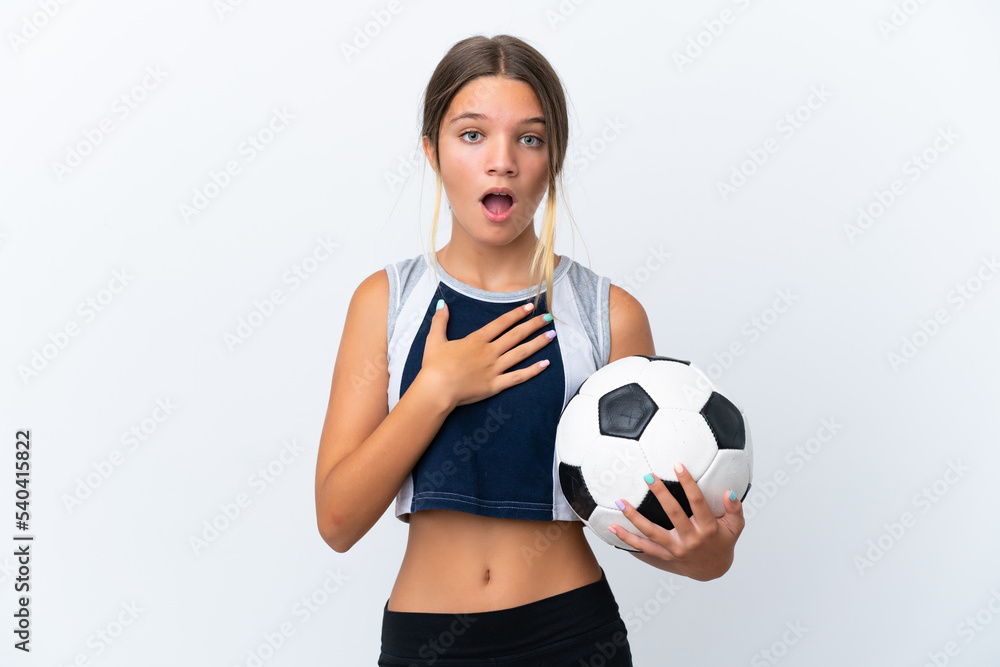 Little caucasian girl playing football isolated on white background ...