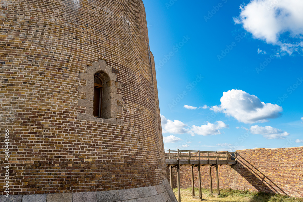Detailed view of the stonework structure of a Martello tower in the ...
