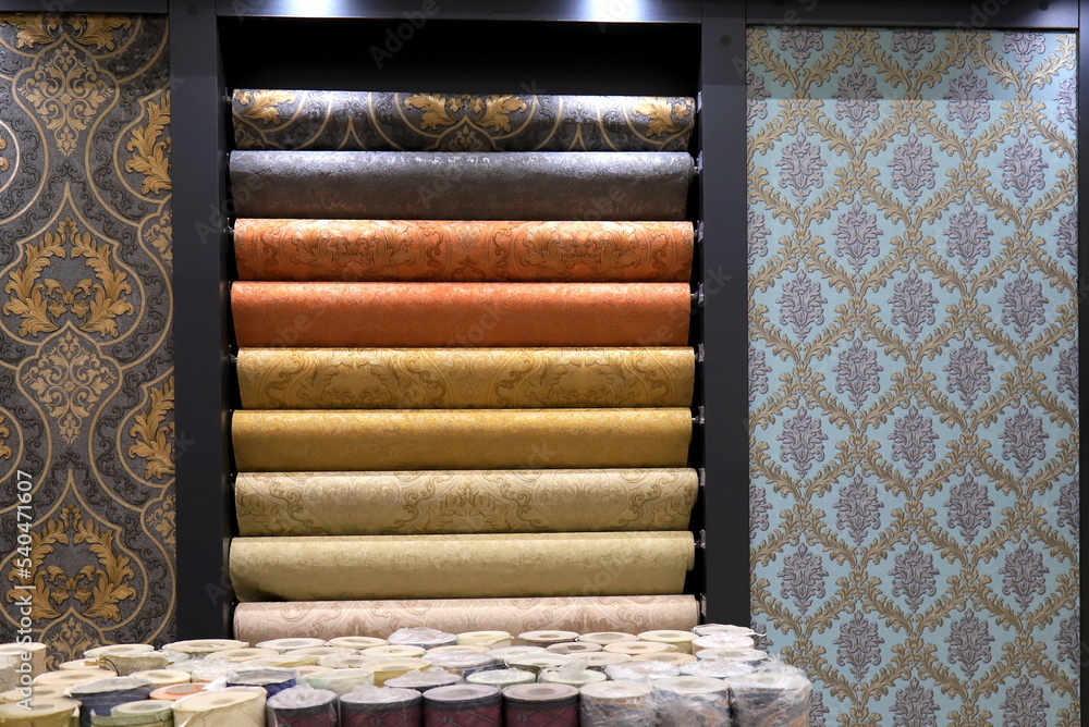 Vinyl wallpaper in roll in building materials store, background ...