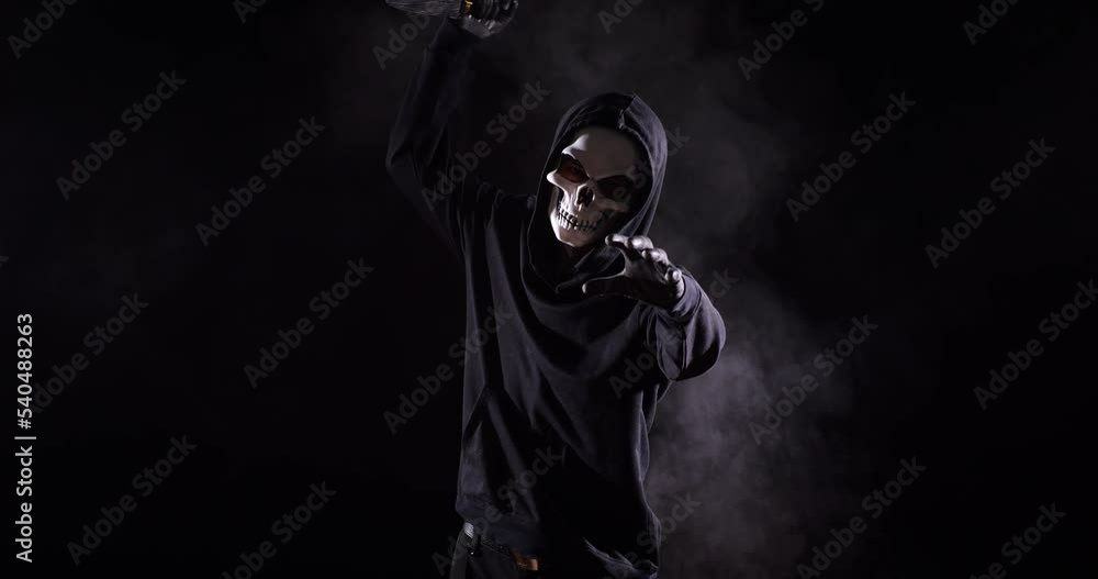 Scary Man In The Hooded Sweatshirt Wearing Halloween Mask Holding A ...