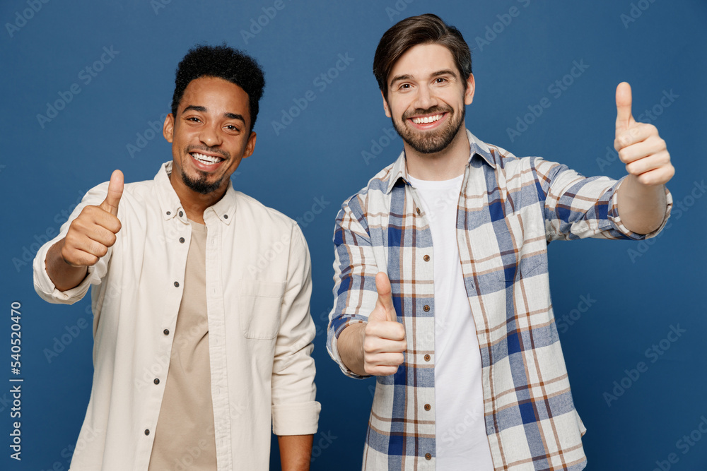 Foto de Young two friends satisfied smiling happy men 20s wear white ...