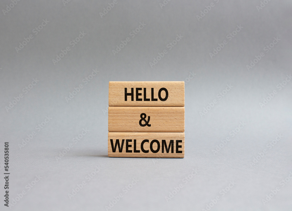 Hello and Welcome symbol. Concept words Hello and Welcome on wooden ...