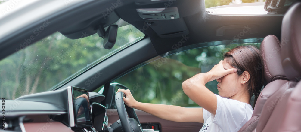 woman feeling stress and angry during drive car long time. Asian girl ...
