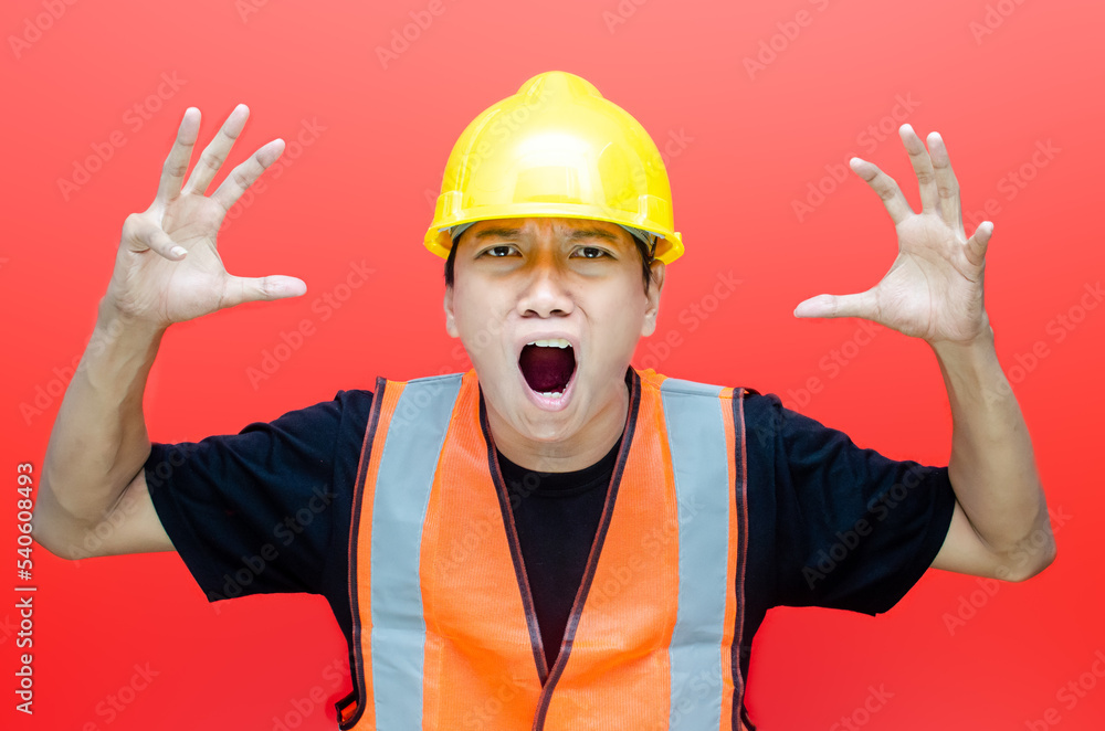 young asian male construction worker or engineer shows expresion of ...