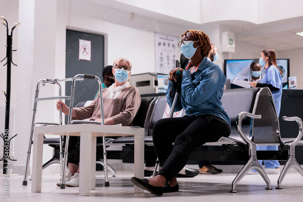 Physical rehabilitation office vestibule with multiple patients of ...
