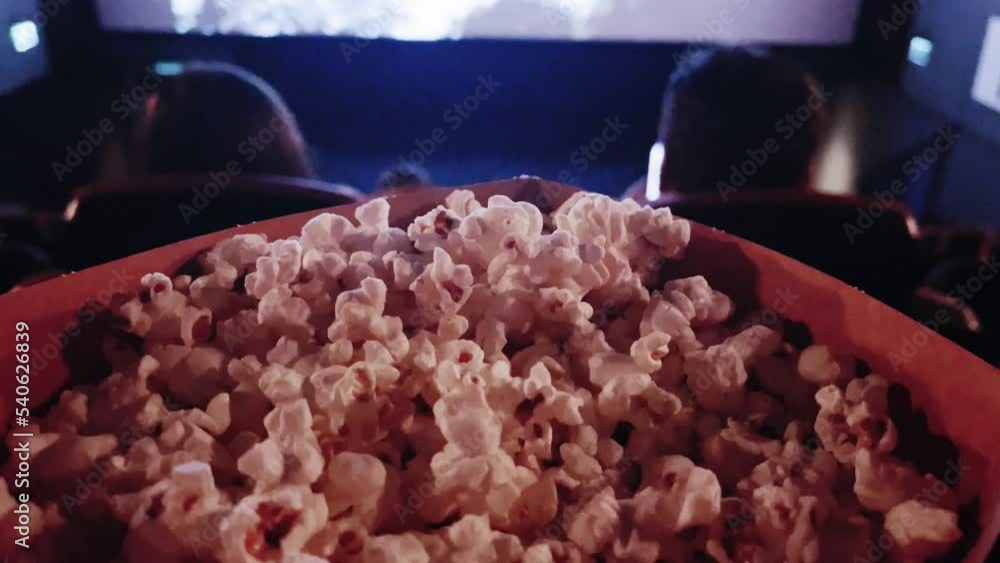 Cinema and entertainment, popcorn box in the movie theatre for tv show ...