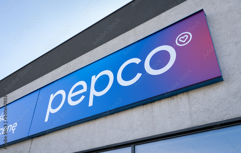 Pepco store with brand logo sign board hanging above entrance door ...