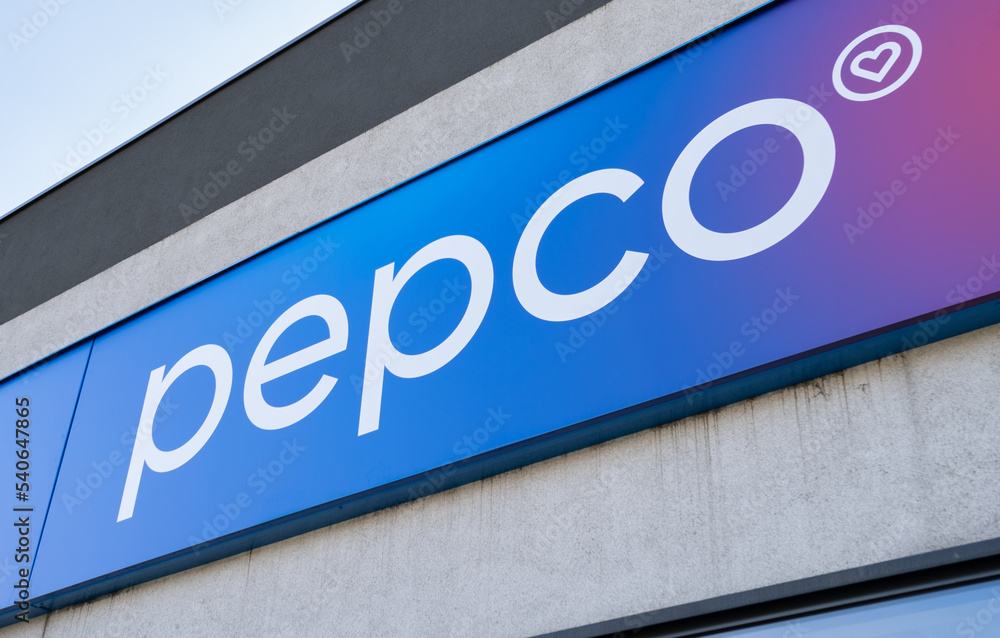 Pepco store with brand logo sign board hanging above entrance door ...