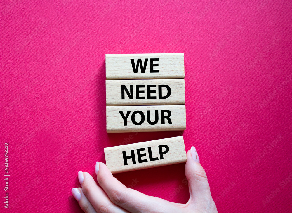 We need your help symbol. Wooden blocks with words We need your help ...
