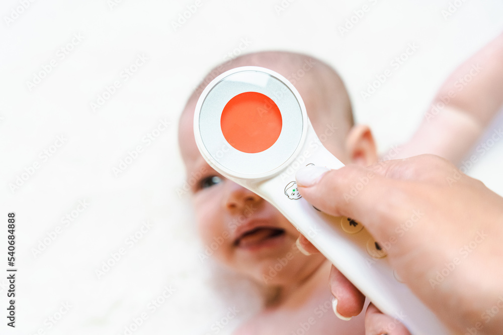 Electronic thermometer fever kid. Doctor check cold flu baby ...