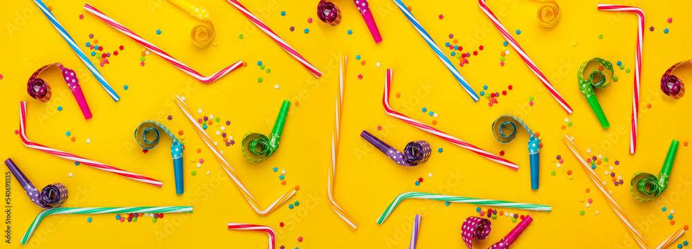 Abstract colored party background. Multi-colored party horns ...