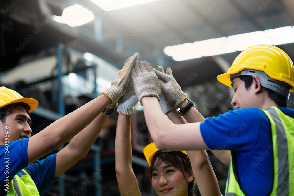 Fototapeta Unity and teamwork concept. team standing hands together ...