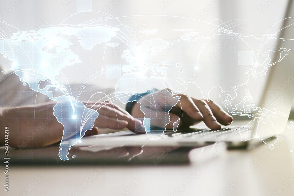 Abstract graphic digital world map with connections and hands typing on ...
