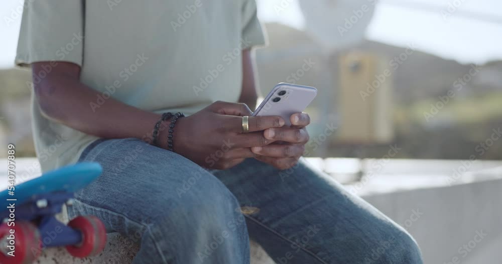 Skater hands, phone or networking on social media app, internet search ...