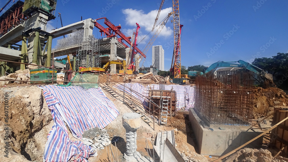JOHOR, MALAYSIA -JUNE 17, 2022: The construction site is in progress. Construction work is being ...