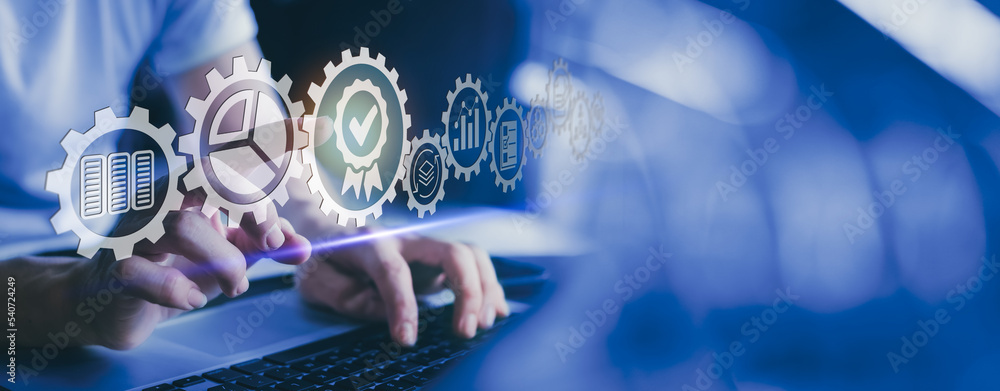 Businessman working on laptops with signs of the top service Quality control certification ...