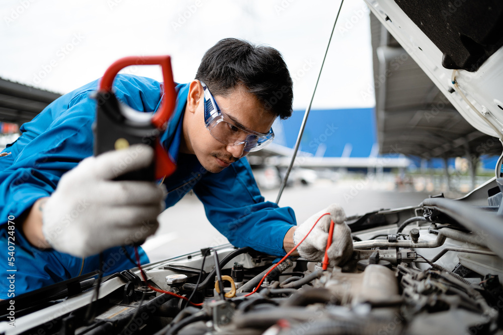 Car Mechanics At Work