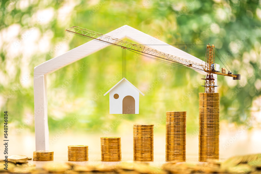 Stacking gold coins with increase and tower crane and hoist brake ...