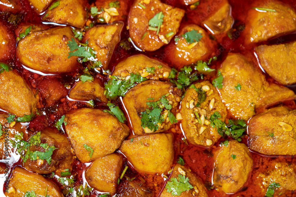 Indian fried potatoes curry or gravy called kashmiri dum aloo ...