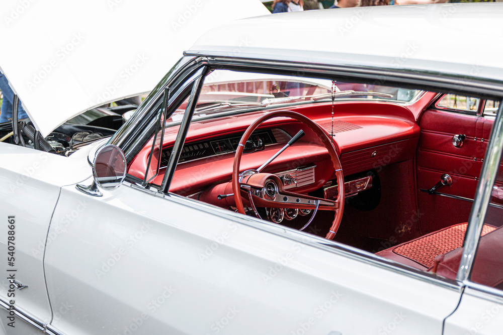 Looking through drivers side window into a classic 1960s chevy impala ...