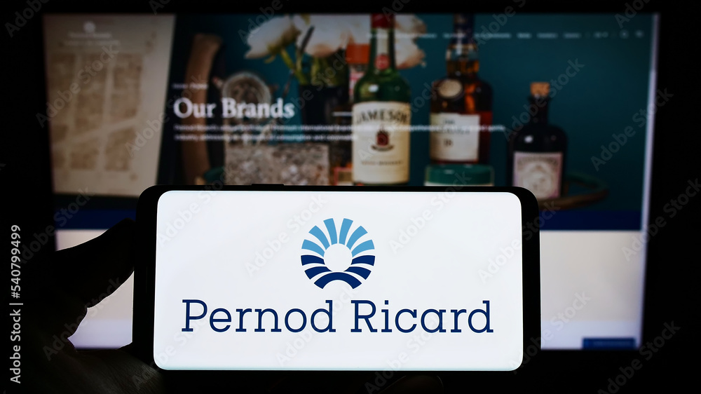 Stuttgart, Germany - 10-14-2022: Person holding cellphone with logo of ...