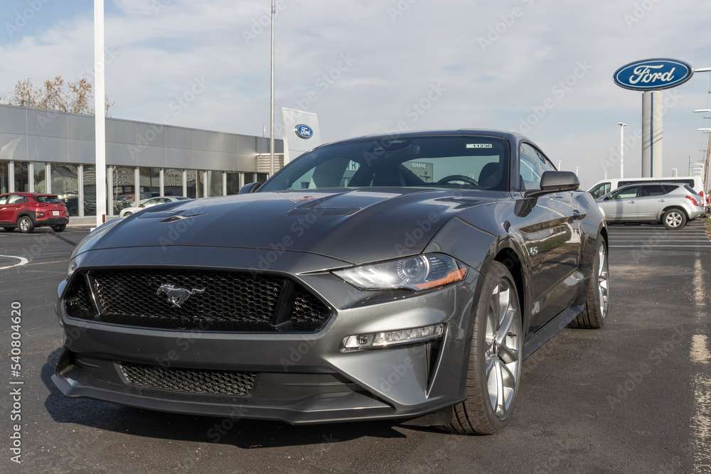 Ford Mustang display at a dealership. Mustangs can be ordered in a base ...