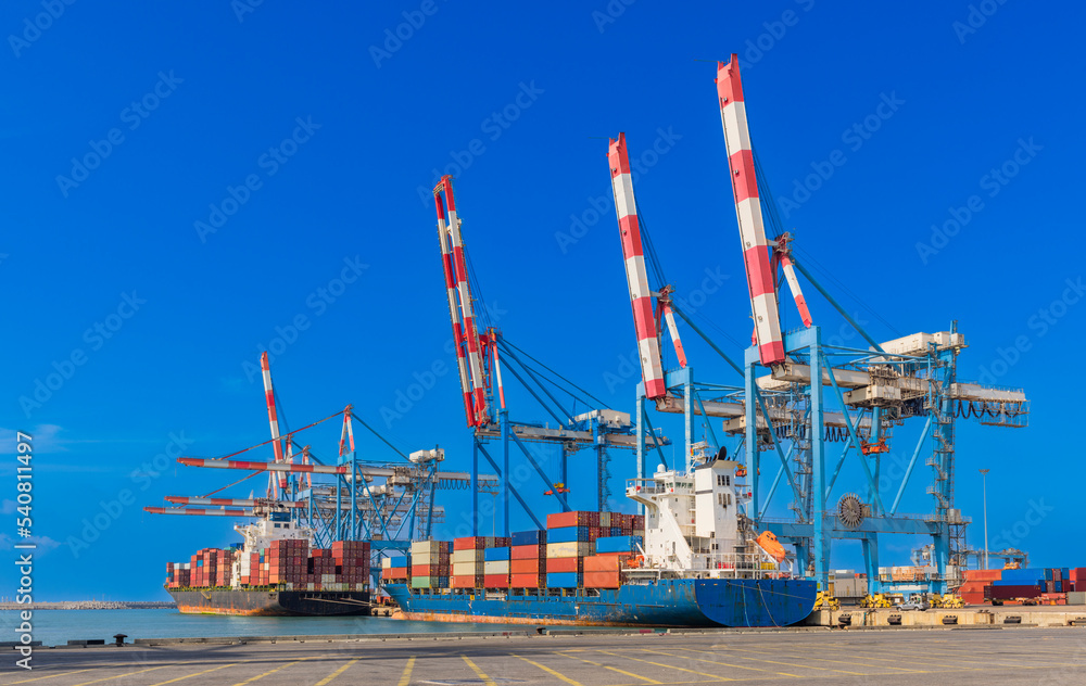 Shipping containers being unloaded at port facilities in Ashdod, Israel ...