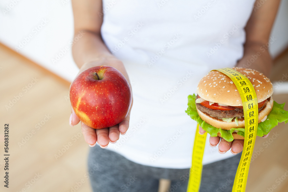 Choose between junk food versus healthy diet Stock Photo | Adobe Stock