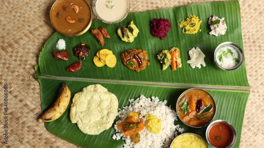 Traditional Onam sadhya rice Sambar, Rasam, parippu dal curry ghee ...